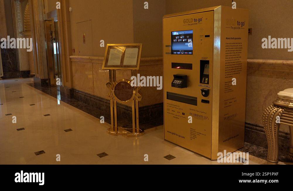 Abu Dhabi, ATM dispensing gold bars, 'Gold to Go' Stock Video Footage ...