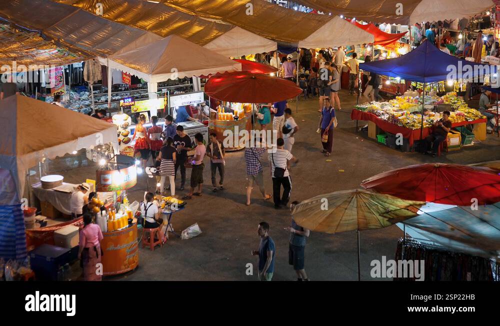 Tourists shopping at Night market in Thailand. Time lapse Stock Video ...