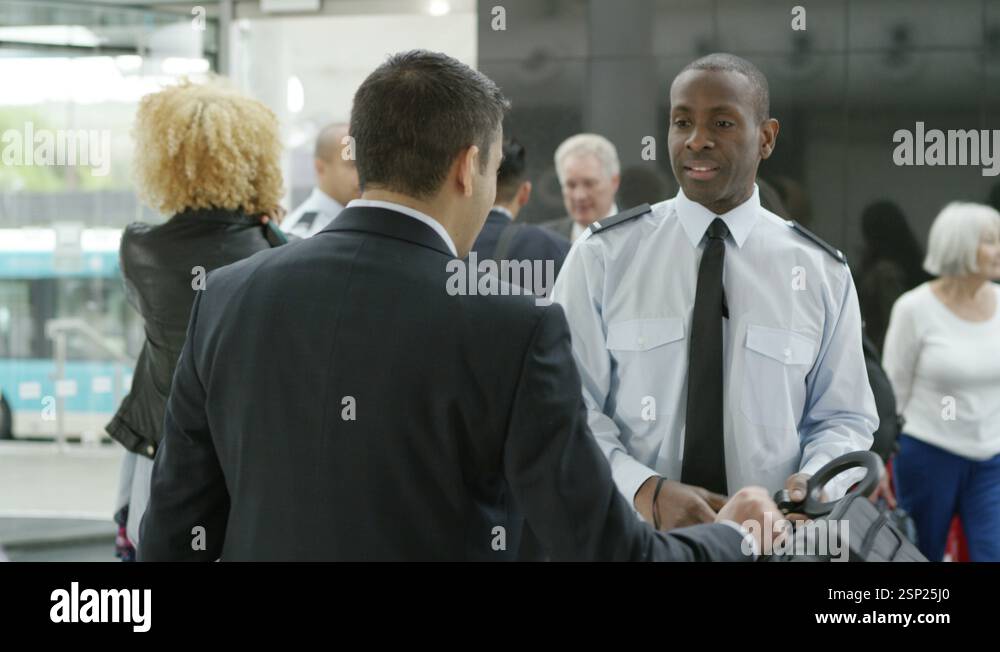 4K Airport security guards on duty, searching passengers before a ...