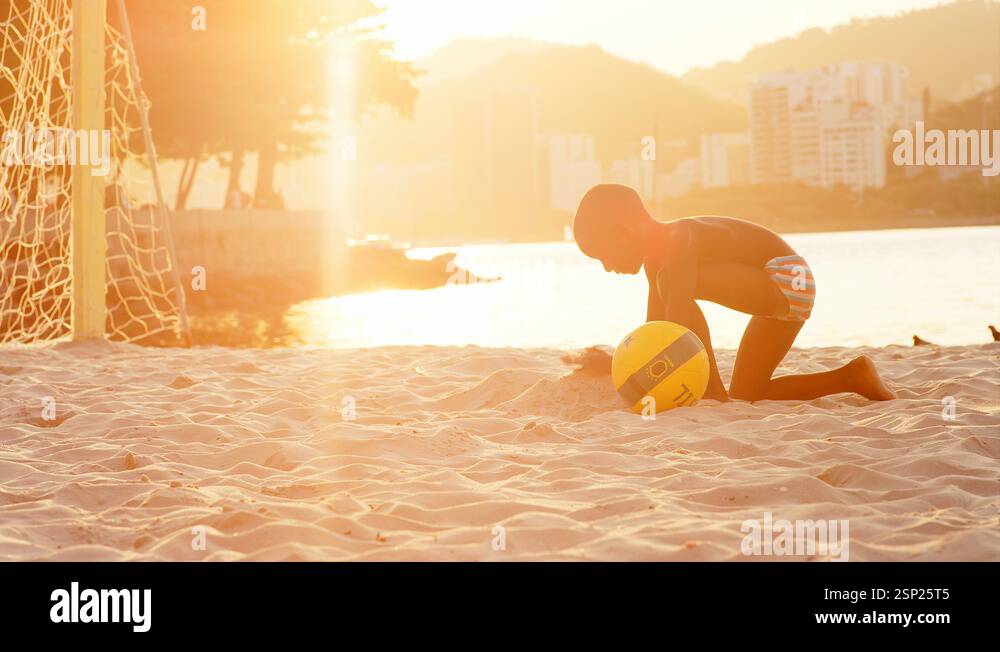 Kids playing soccer on a beach in Brazil Stock Video Footage - Alamy