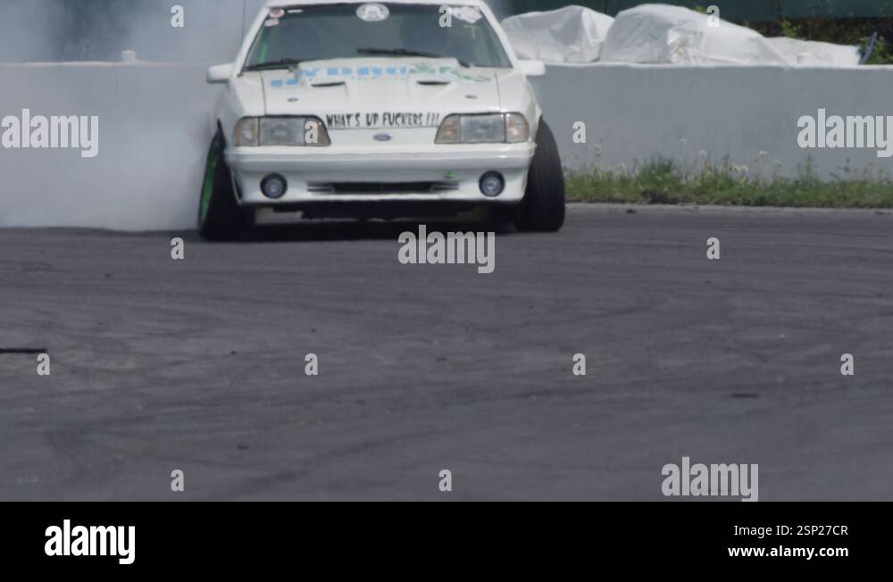 Race cars drifting on a track at a motorsport park Stock Video Footage ...