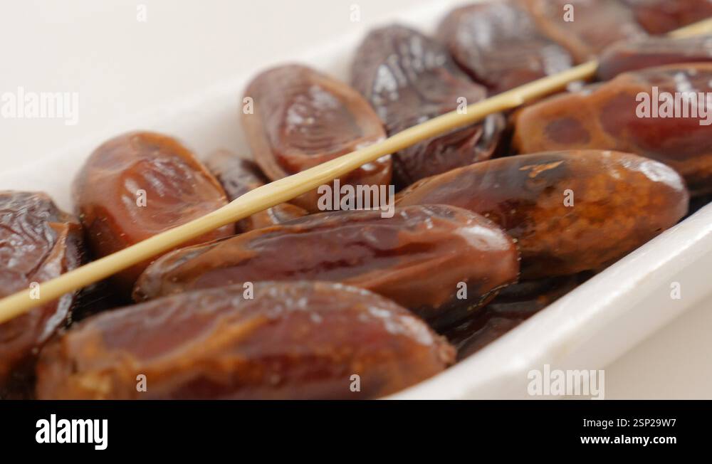 Phoenix dactylifera exotic fruit in the package slow panning 4K 2160p ...