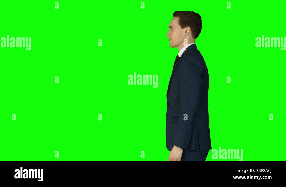 Businessman lifting something on his hand on green screen Stock Video ...
