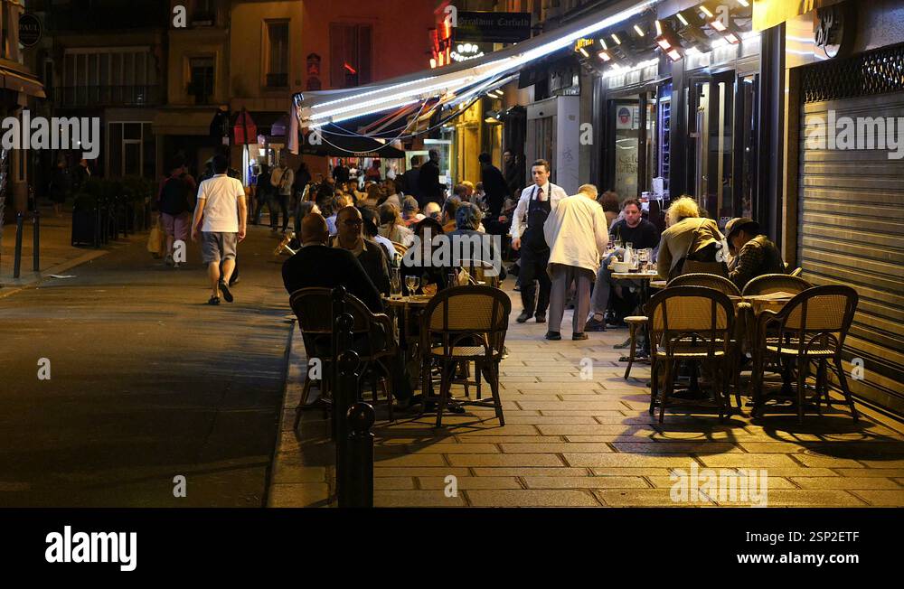Restaurant terrace at night. Paris, France Stock Video Footage - Alamy