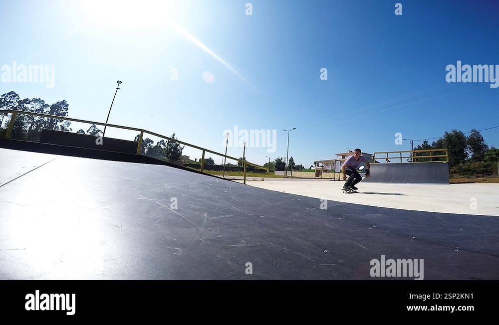 Skateboarder performing an ollie grab Stock Video Footage - Alamy