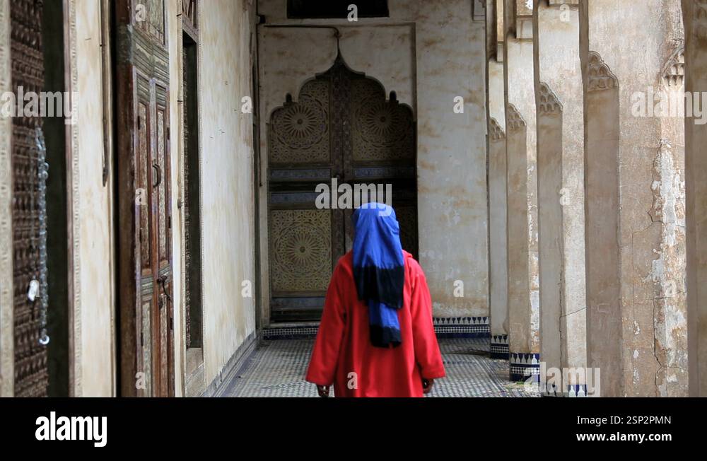 Male in traditional clothing in an old Palace Fez, Morocco, Africa ...
