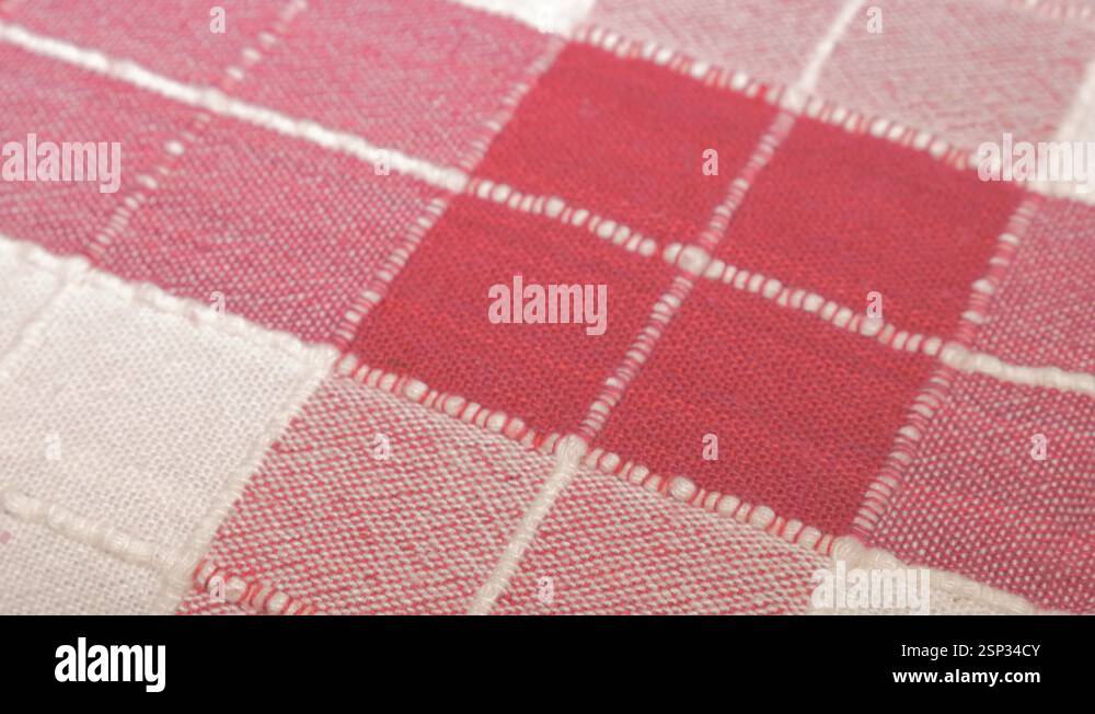 Checkered red fabric pattern close-up 4K 3840X2160 UHD panning footage ...