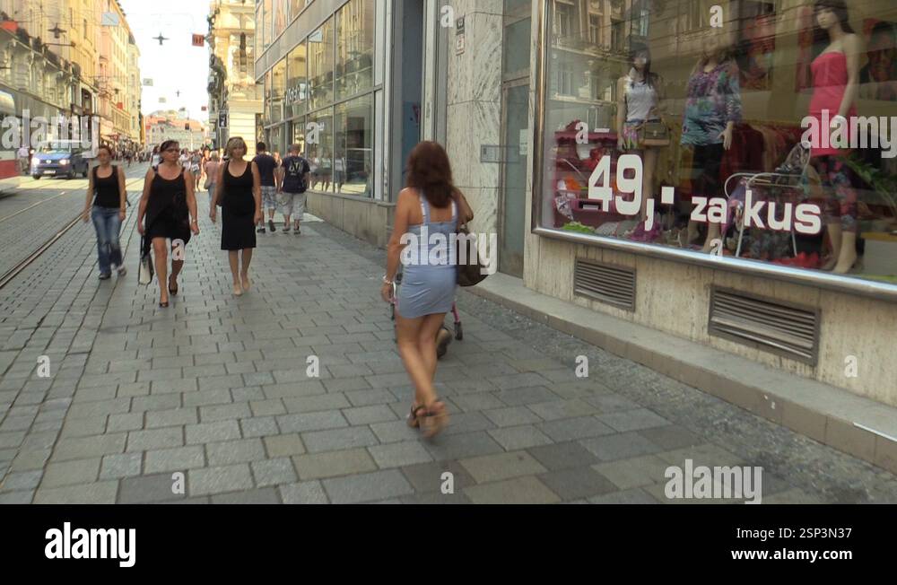 Authentic homeless gypsy man driving with a shopping cart down the ...
