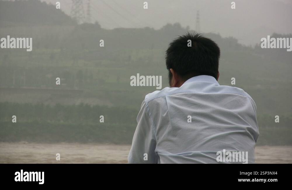 Man looking over river Stock Videos & Footage - HD and 4K Video Clips ...