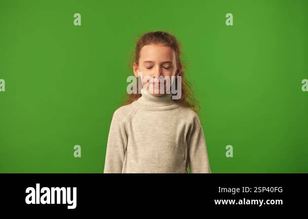 Children emotions concept. Little girl child makes grimaces funny faces ...