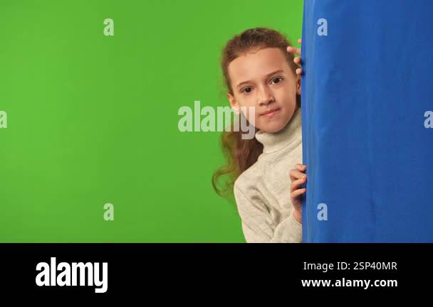 Children emotions concept. Little girl child peeks out with wow amazed ...