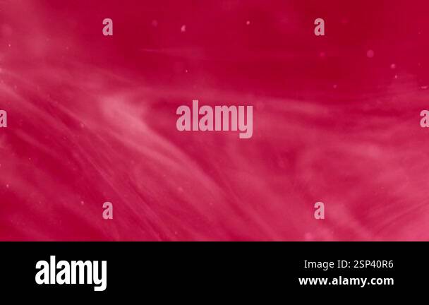 Dye liquid drop. Smoke cloud. Defocused red color shimmering glitter ...