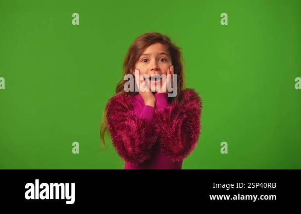 Children emotions concept. Girl child with shocked surprised face looks ...