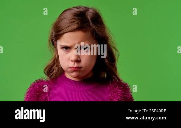 Children emotions concept. Little girl child with crossed arms and ...