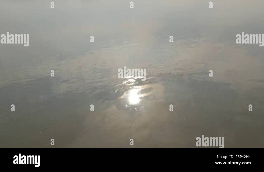 Early morning sun reflection in river Danube water surface 4K 2160p UHD ...