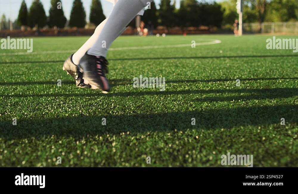 A soccer player does some fancy footwork and opponents slide tackle him ...