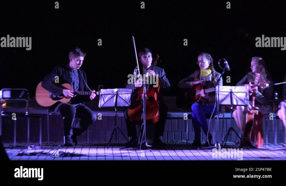 free concert of singing poetry by local musicians at night. 4K Stock ...