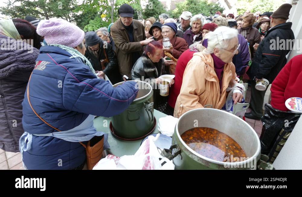 Giving food to poor Stock Videos & Footage - HD and 4K Video Clips - Alamy