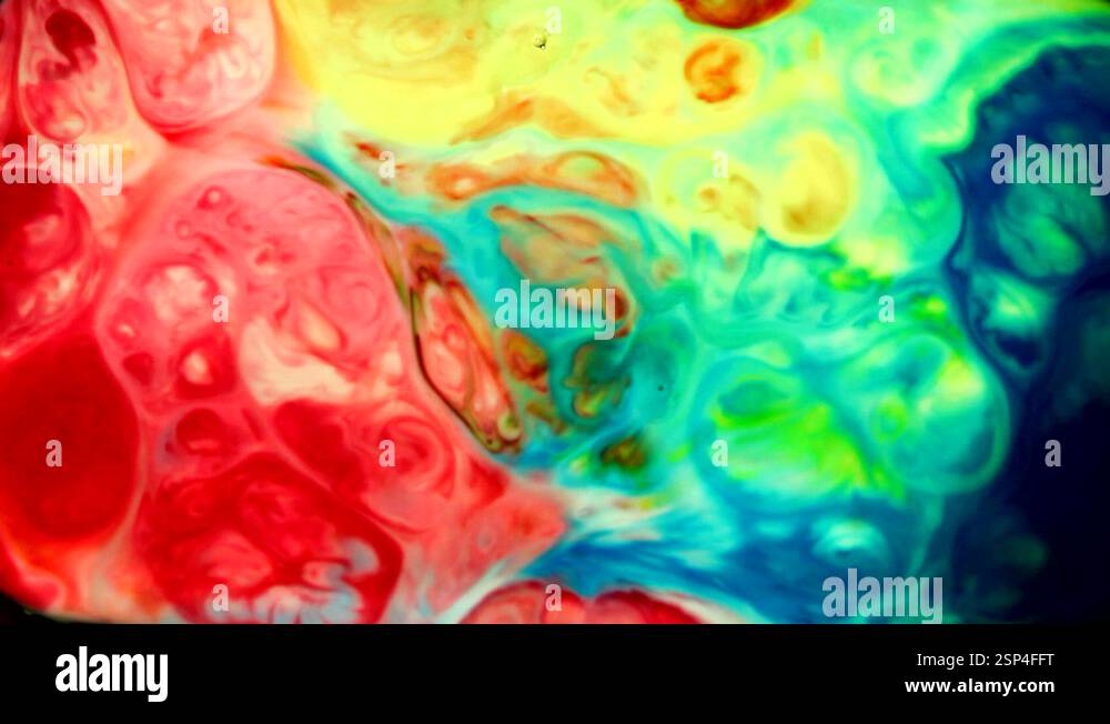 Liquid ink colors blending burst swirl Stock Video Footage - Alamy