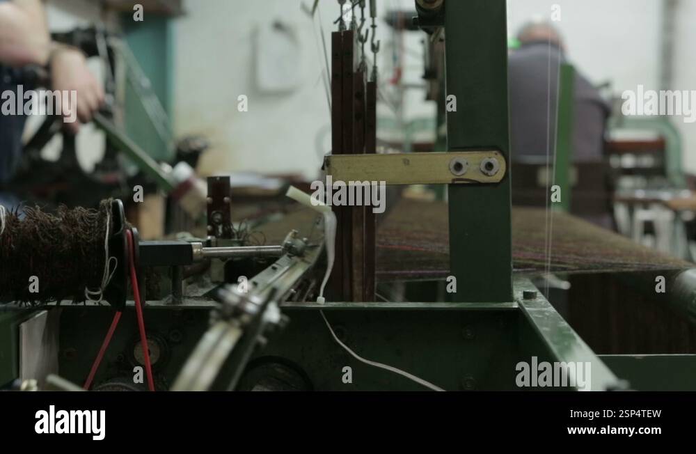 Harris Tweed being woven from yarn in a local mill on the Isle of ...