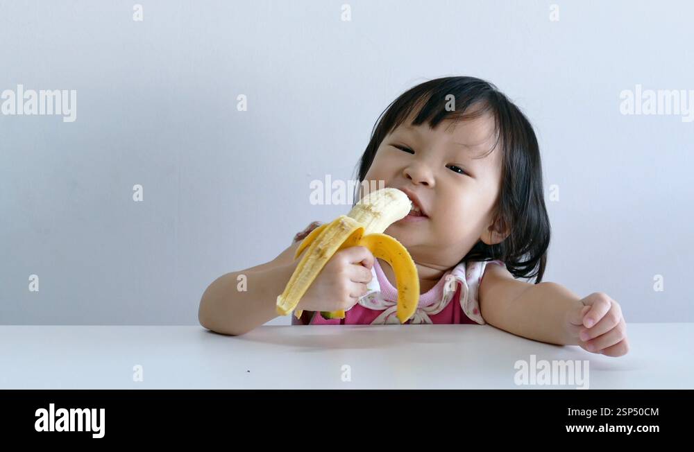 Girl Eating Banana Stock Videos And Footage Hd And 4k Video Clips Alamy