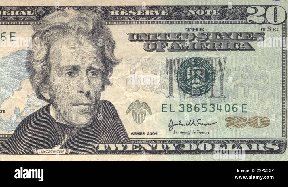 Twenty dollar note obverse dolly shot from right to left showing 20 ...