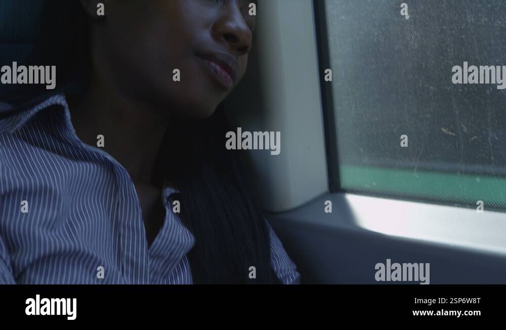 4K Tired young woman takes a break from working on train to catch some ...