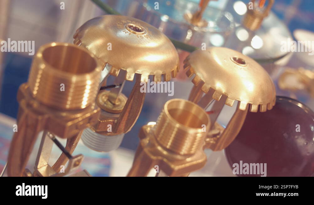 A wide range of fire sprinklers, different colors and sizes, on the ...