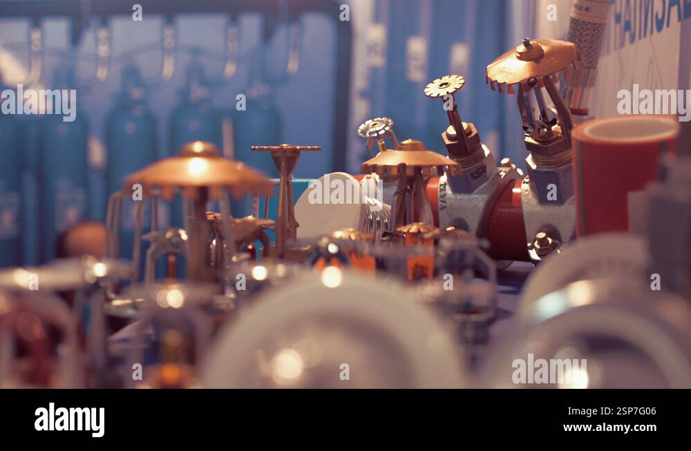 A wide range of fire sprinklers, different colors and sizes, on the ...