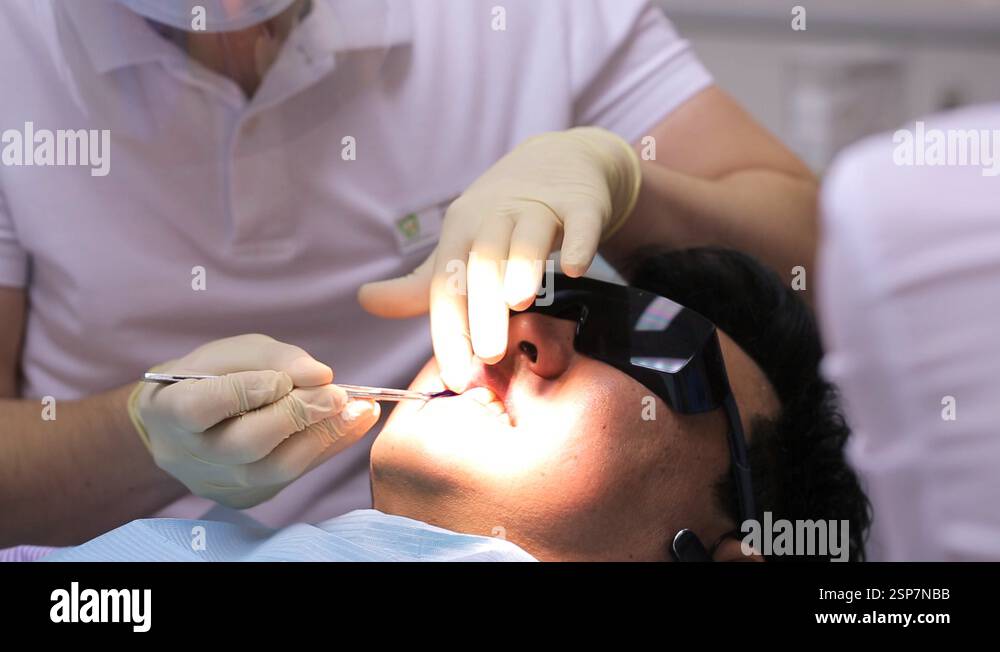 Verification of occlusion with occlusal paper dentist patient Stock ...