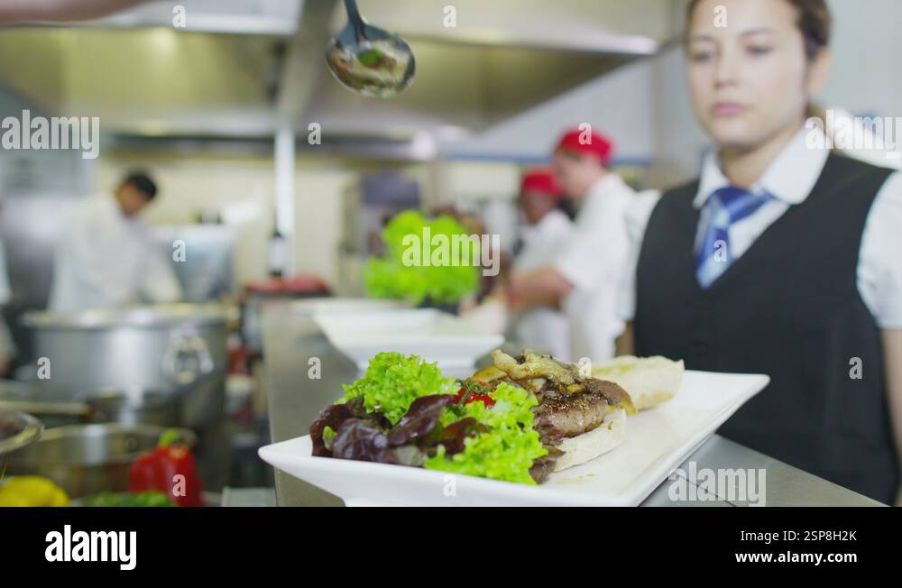 4K Delicious gourmet dish is being given the finishing touches Stock ...