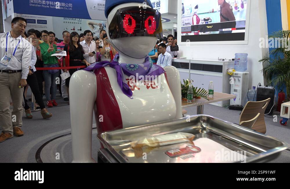 Humanoid robots function as waitresses in restaurant, trade show China ...