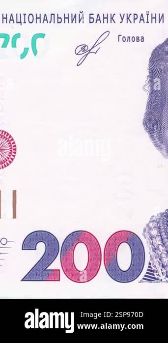 Close-up view of Ukrainian 200 hryvnia banknote focusing on ...