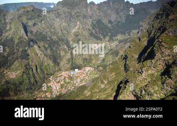 Aerial footage over mountains in Madeira Island, Portugal. Small ...