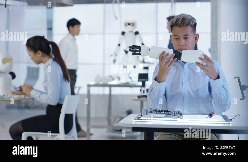 4K Technical design team working on construction of robot in modern lab ...