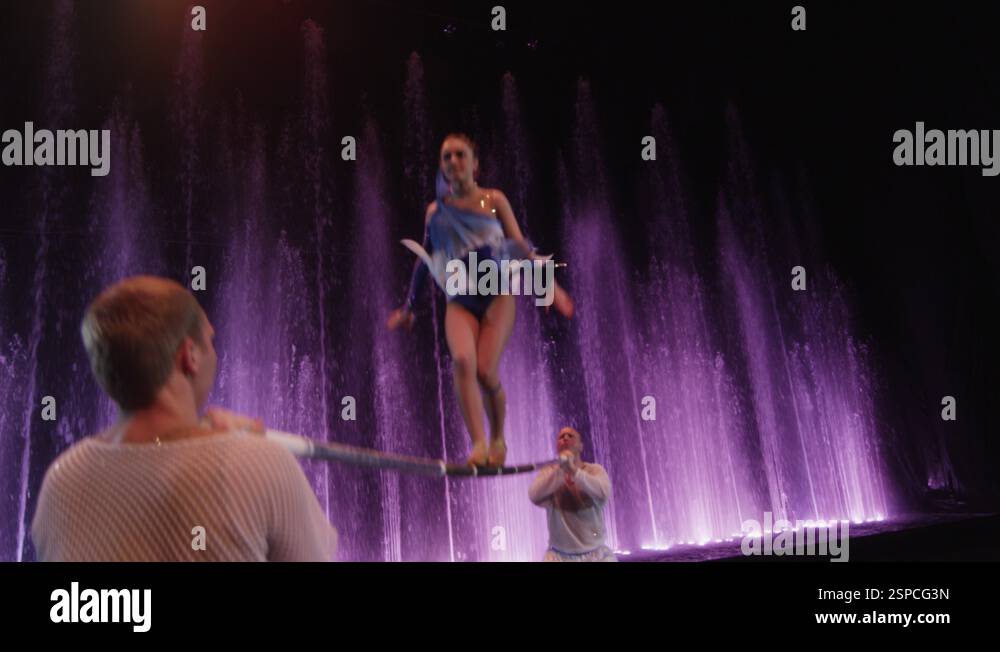 Woman acrobat performing on horizontal bar in the circus Stock Video ...