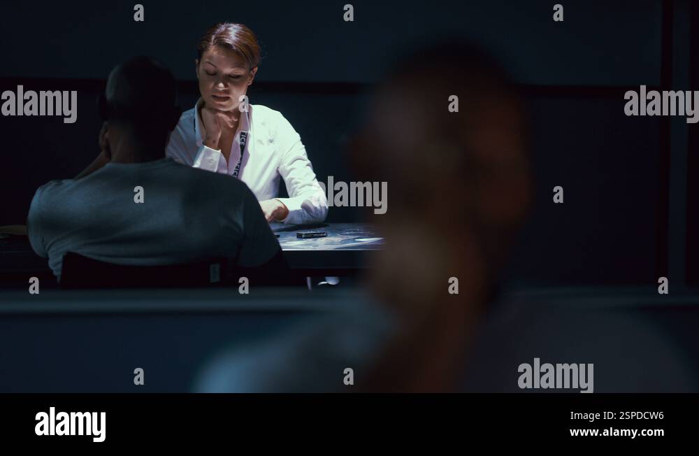 4K Crime suspect being questioned by police detective in interview room ...