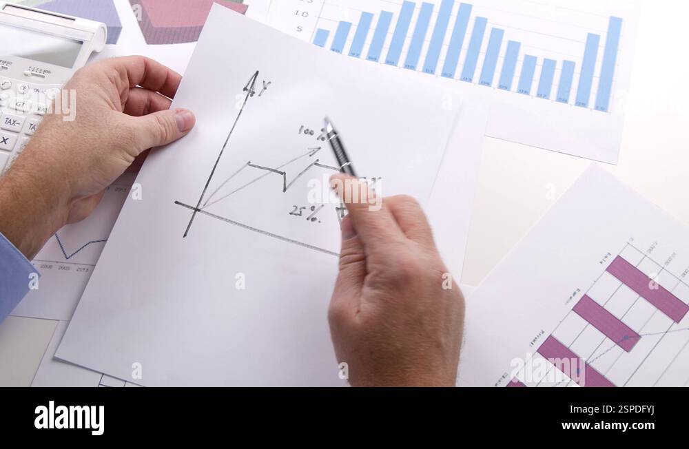 Businessman Drawing a Graphic Chart Salesman Analyze Financial Diagram ...