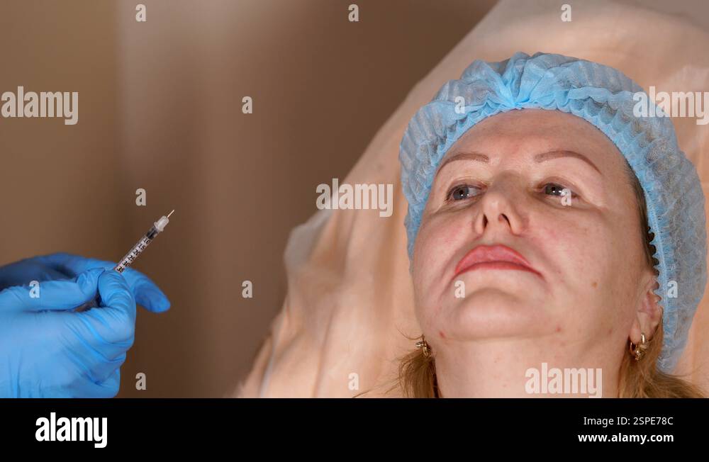 The doctor makes a botox injection to get rid of perioral wrinkles ...