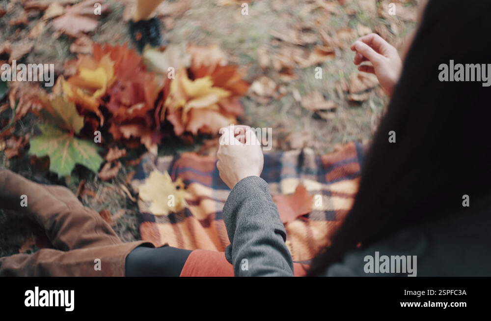 cute little girl come running into the arms to her beautiful mother ...