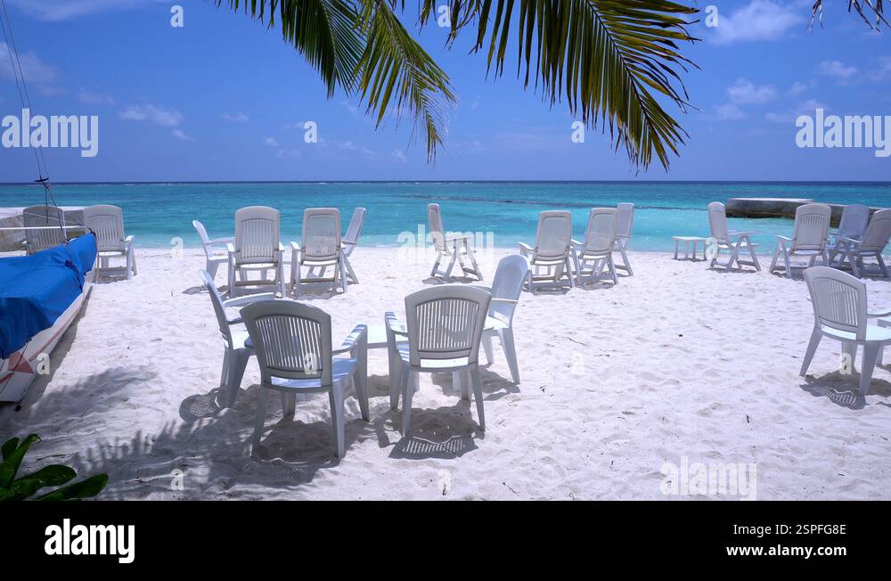 Sandy beach table chairs Stock Videos & Footage - HD and 4K Video Clips ...