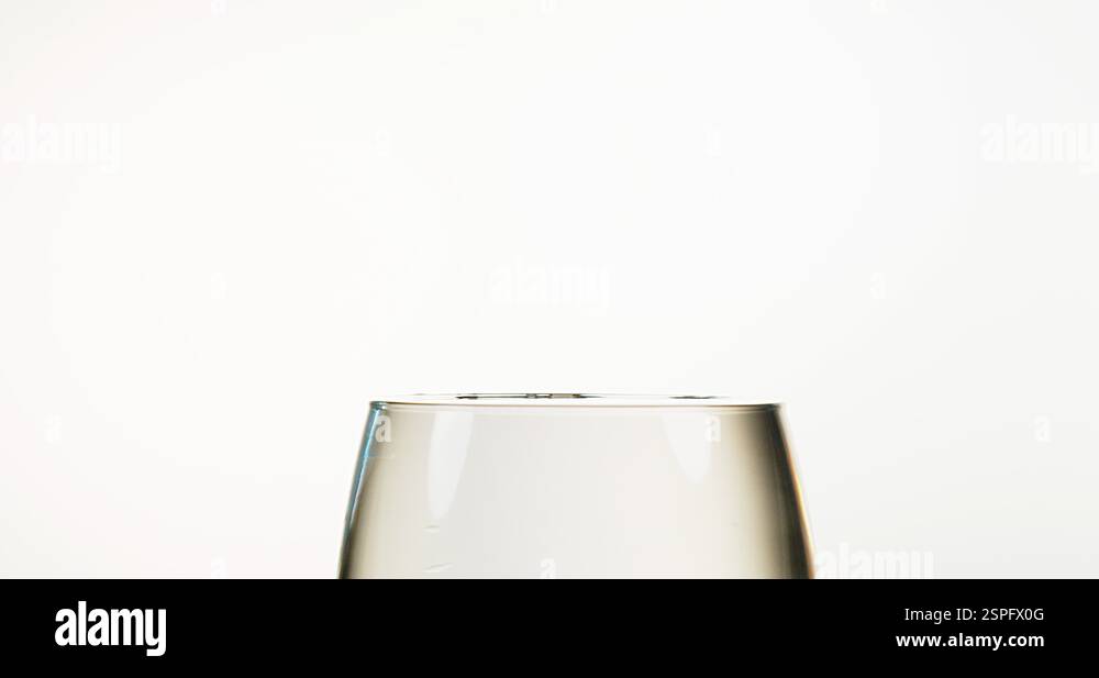 Drop of Water falling into a Glass, Slow motion 4K Stock Video Footage ...