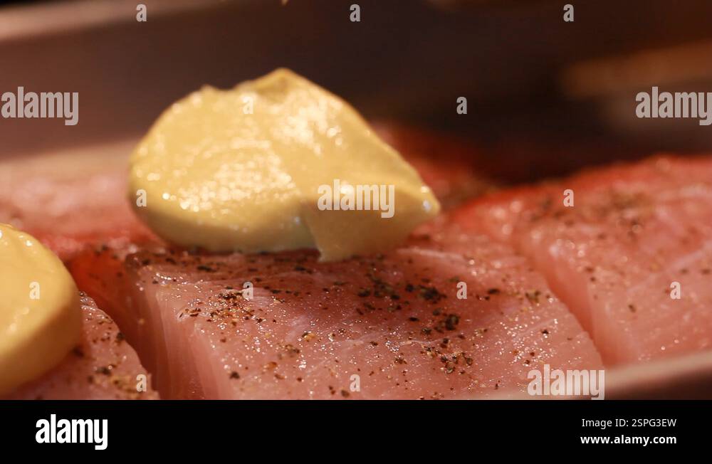 Chef Preparation of seafood skinless raw Mahi Mahi fish with mustard ...
