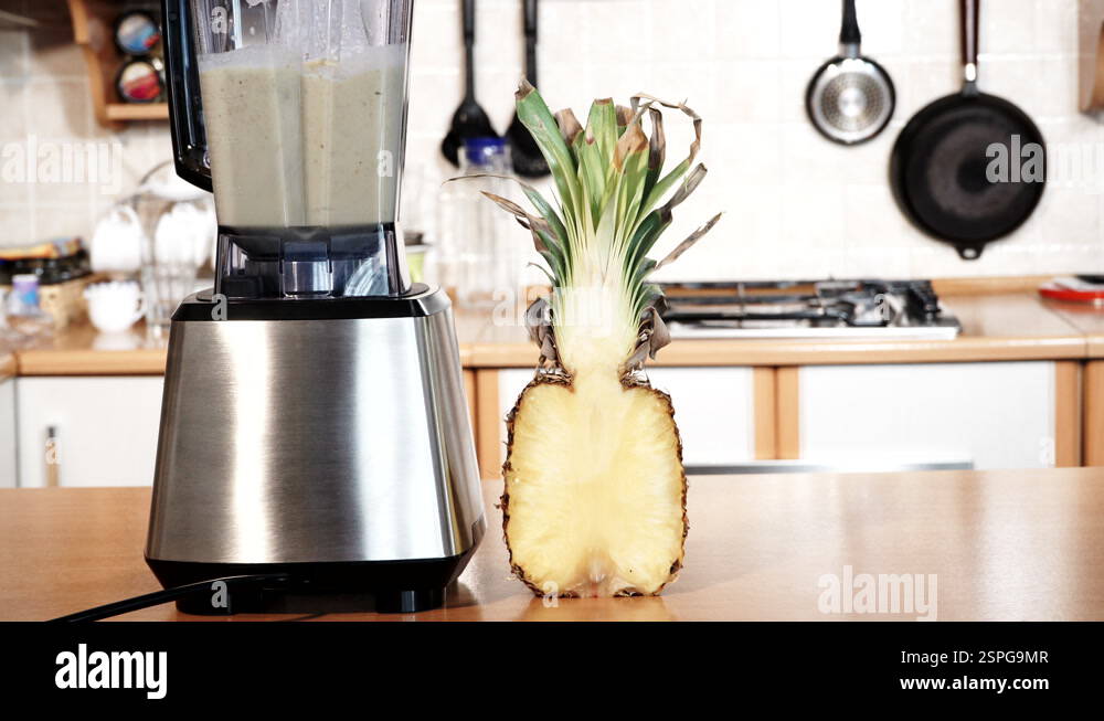 Making pineapple banana fruit shake in blender 4K Stock Video Footage ...