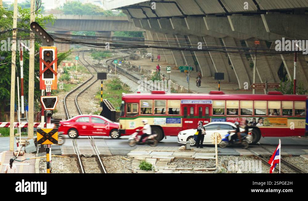 Rail crossing of train run from the city to the suburbs for a short ...