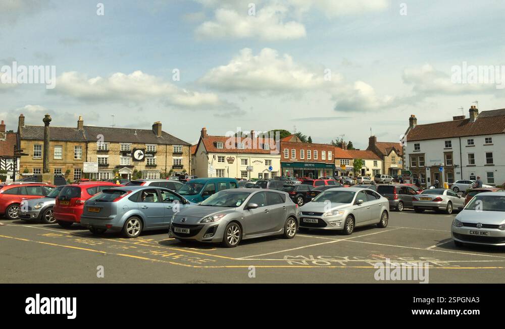 Pan across the market square in the market town of Helmsley in North ...