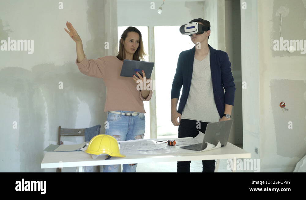 Mother And Son With Vr Goggle And Tablet Watching Virtual Project At