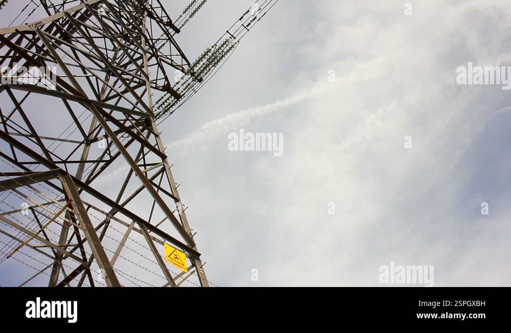 Overhead electricity supply grid power line pylon tower Stock Video ...