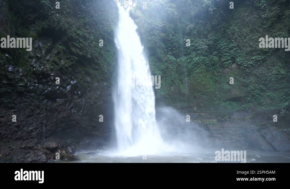Amazing Nungnung waterfall, Falling water hitting water surface Stock ...