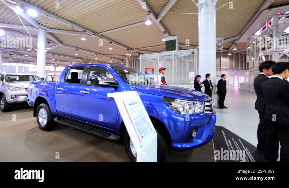 Close view of headlights of luxurious car in Toyota Mega Web. Tokyo ...